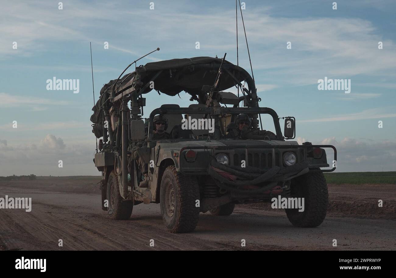 Israeli military vehicles return from central Gaza amid continuing ...