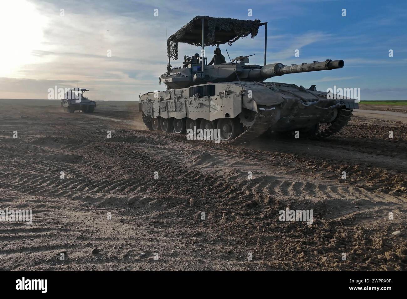 Israeli military armored vehicles return from central Gaza amid ...