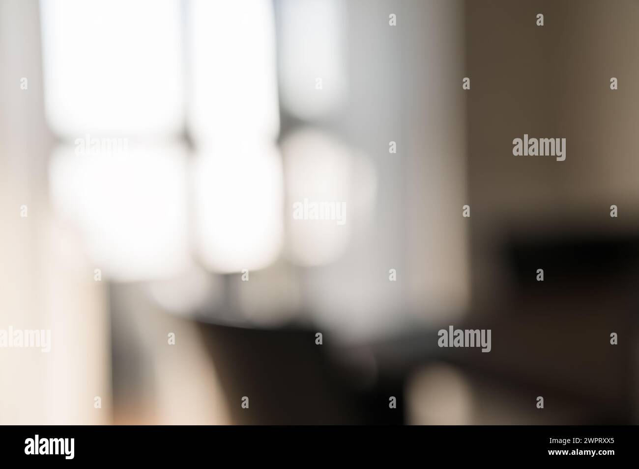 Abstract real blurred background of living room with window light ...
