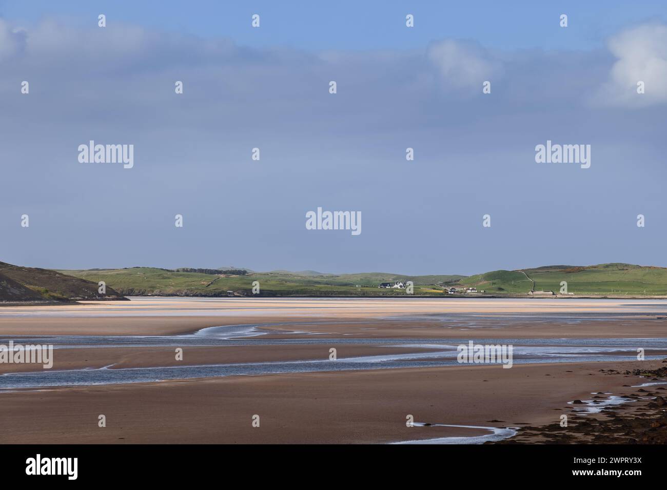 Under a clear sky, the Kyle of Durness unveils its expansive tidal ...