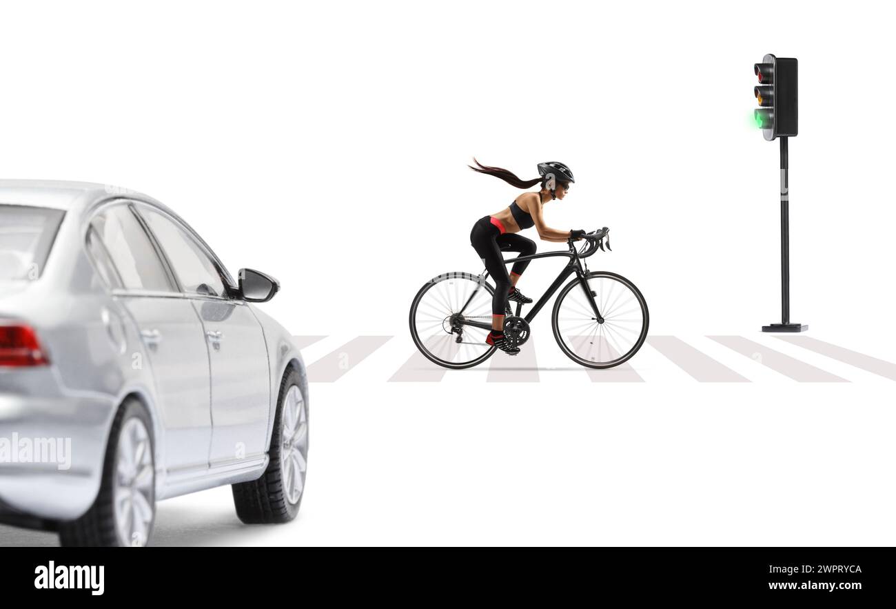 Female cyclist riding a bike over a pedestrian crossing isolated on ...