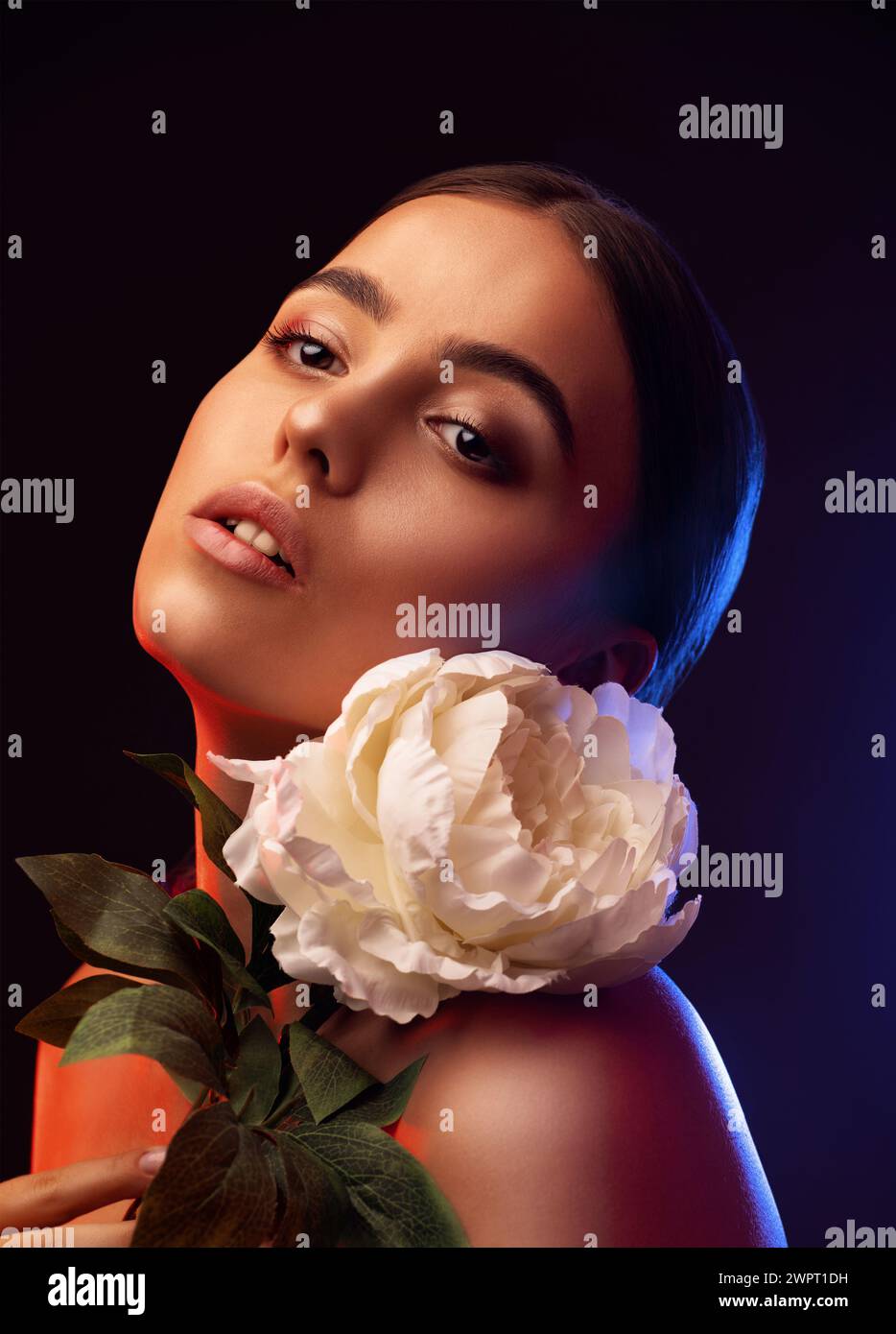 Portrait of attractive girl with healthy clean skin and beautiful make ...