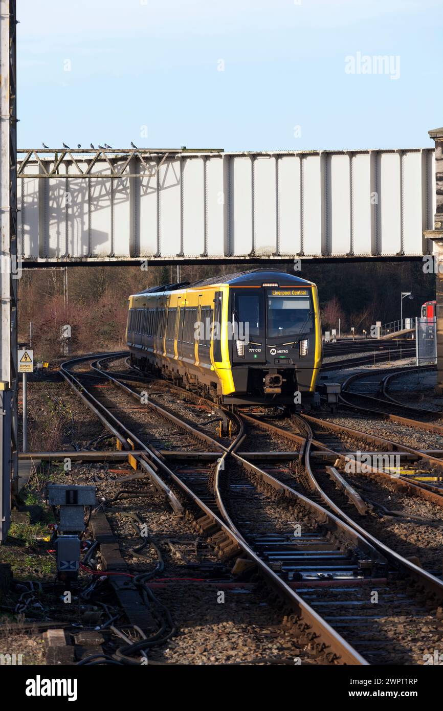 Merseyrail Stadler class 777 3rd rail electric train 777013 arriving at ...