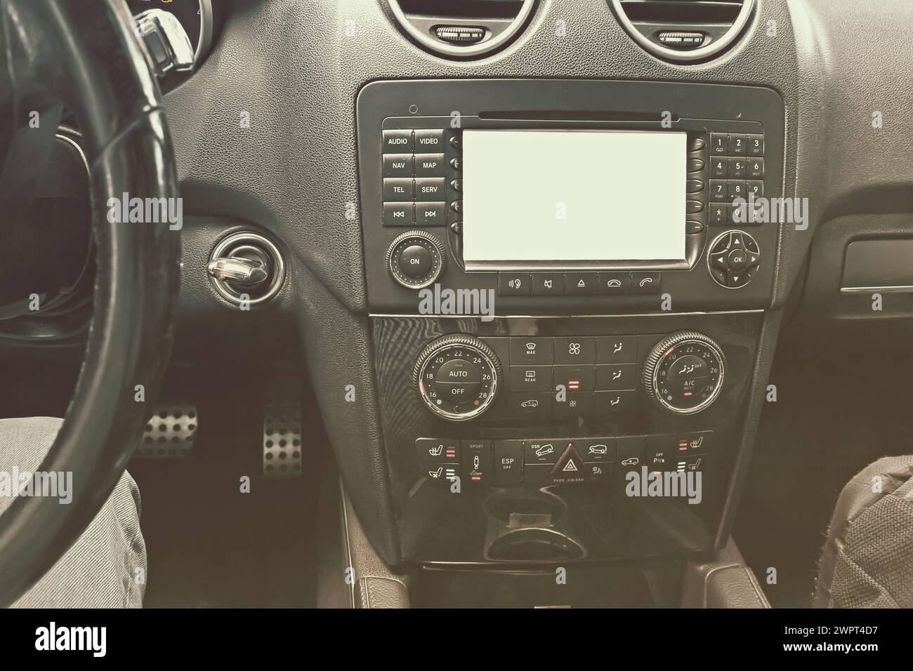 Dashboard car close-up. Many different car buttons with warning lights ...