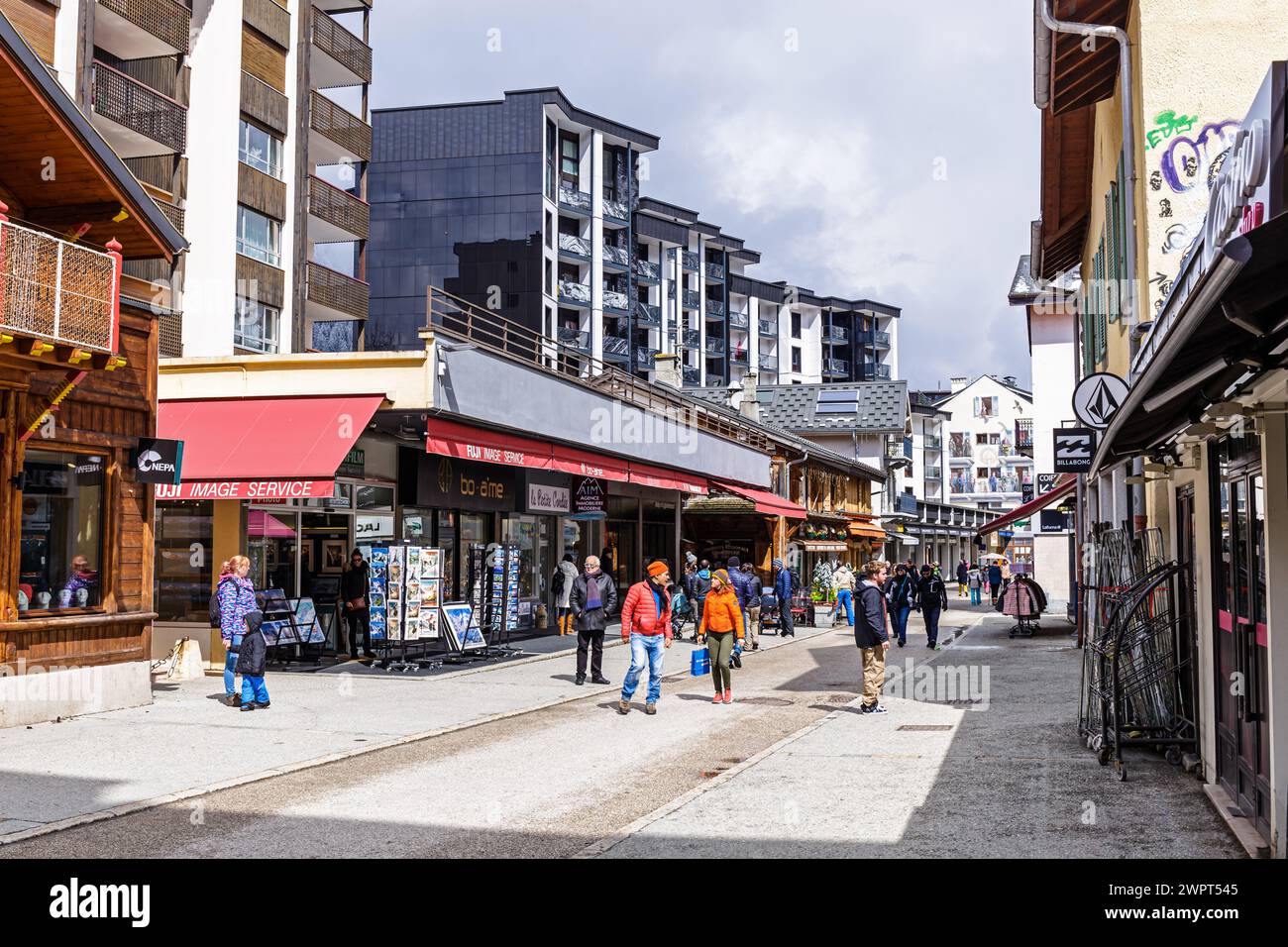 Chamonix-Mont-Blanc, France - April 1, 2018 : Central street with cafes ...