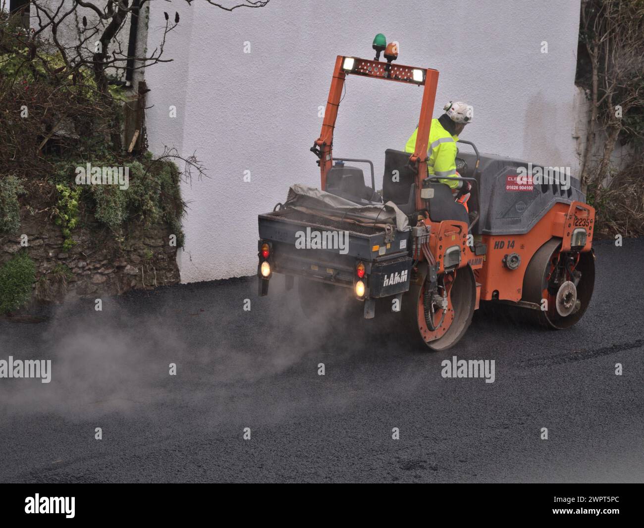 Road resurfacing work, UK Stock Photo - Alamy