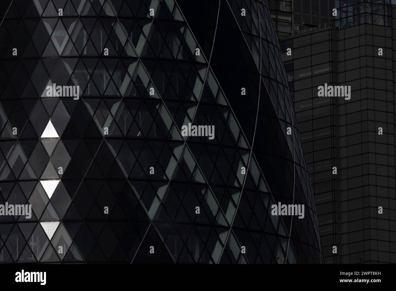 The Gherkin skyscraper building close up of window details with ...