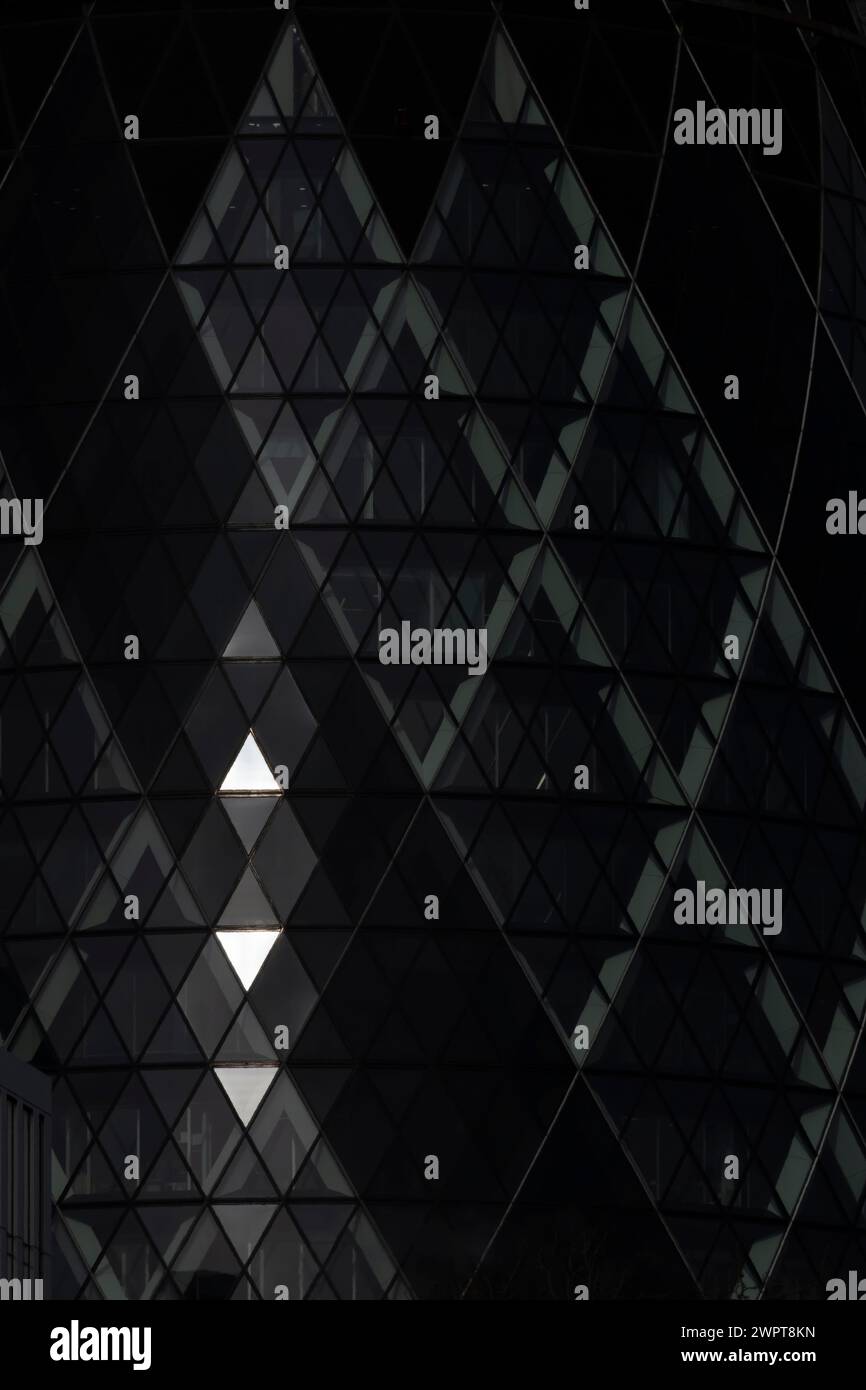 The Gherkin skyscraper building close up of window details with ...