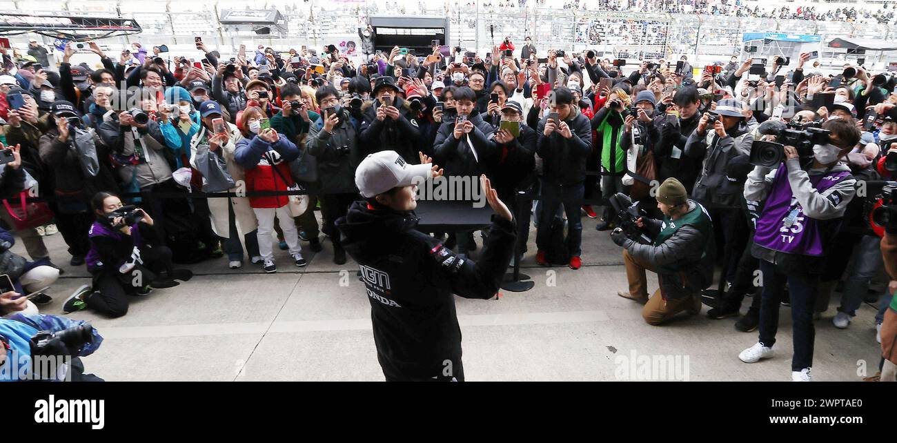 Japanese Juju Noda poses with her fans after debuting the Super Formula ...