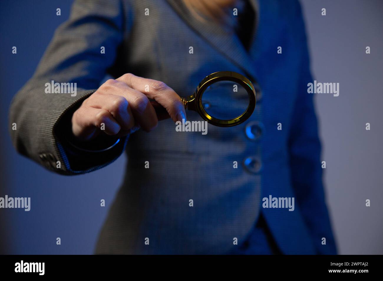 Female fingers hold magnifying hi-res stock photography and images - Alamy