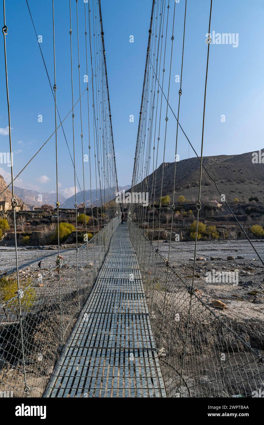 Huge hanging bridge, Chhusang village, Kingdom of Mustang, Nepal Stock ...