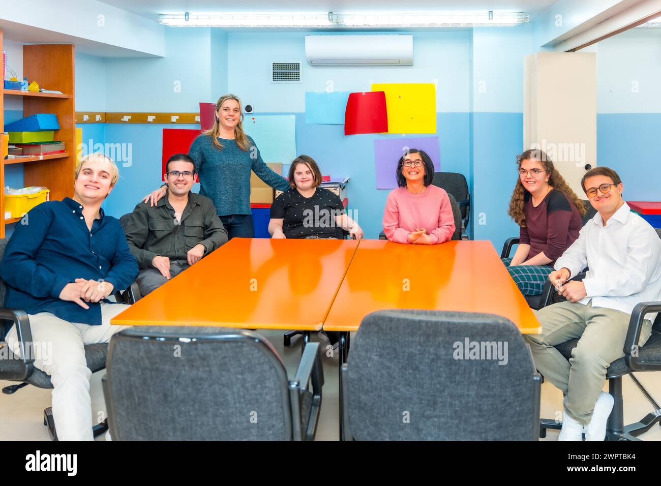 Group class photo portrait in a center for people with special needs ...