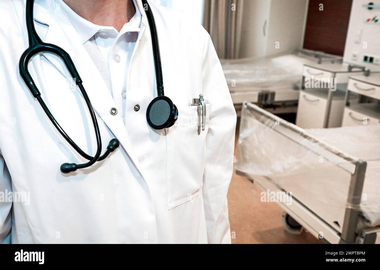 Symbolic image of a doctor with a stethoscope in a hospital room in ...