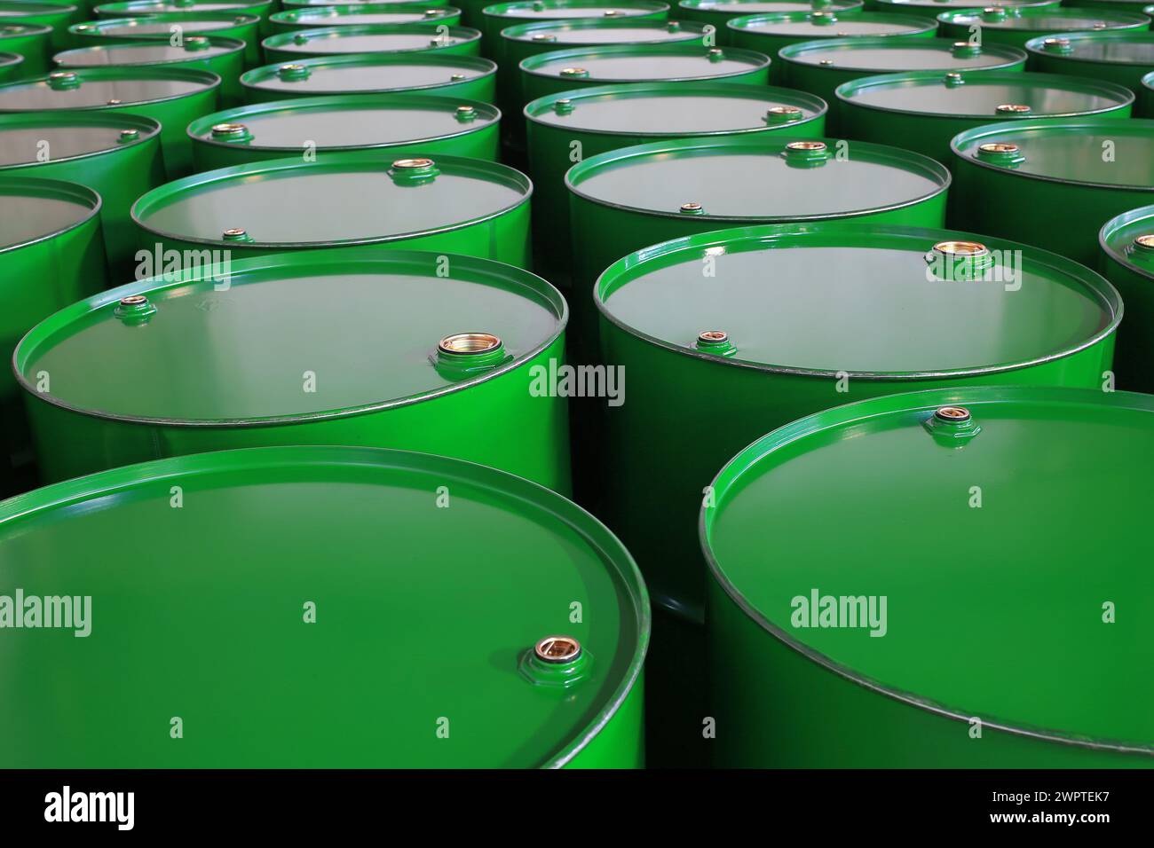 metal barrels of green color Stock Photo - Alamy