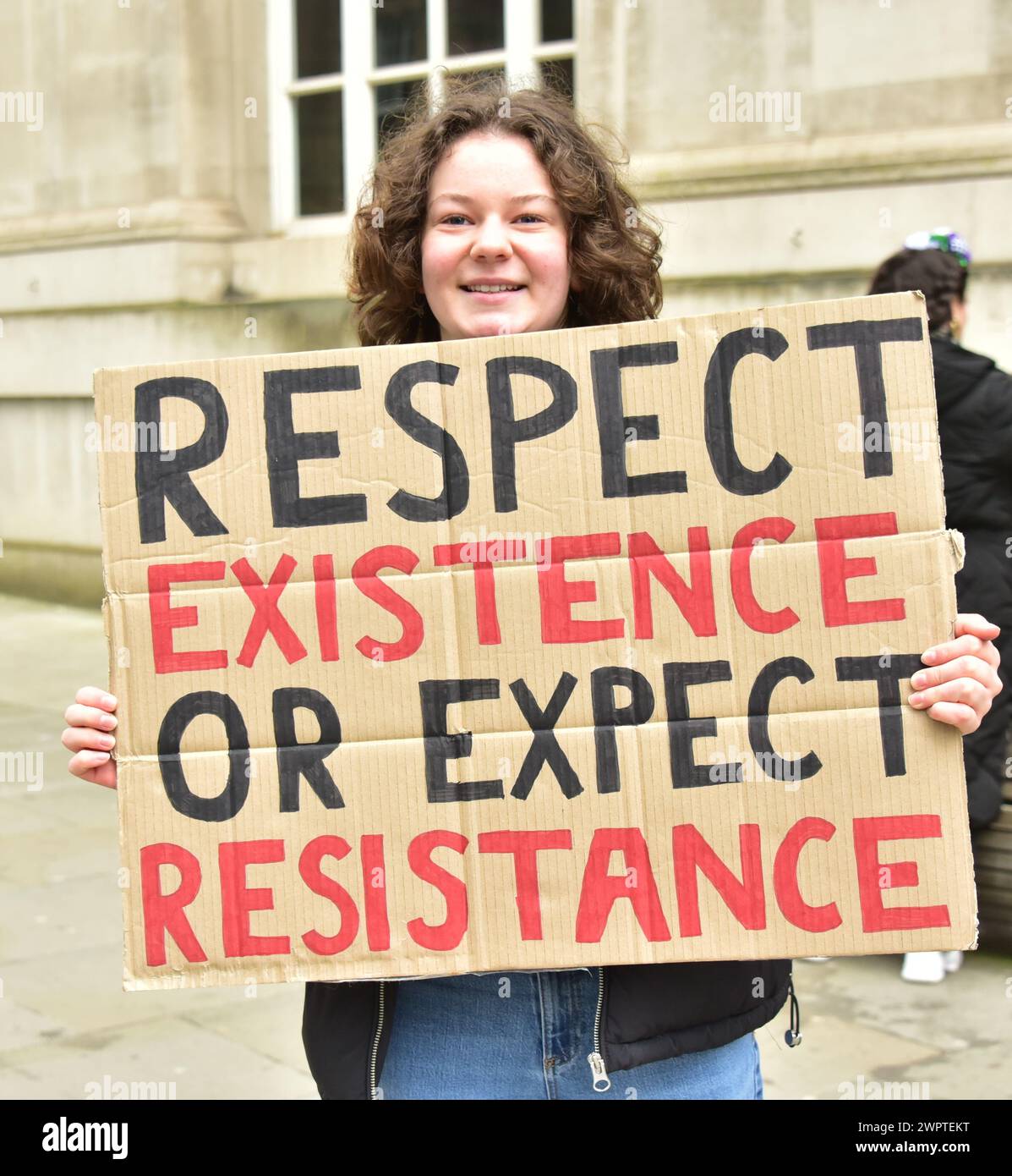 A participant in the Walk for Women, central Manchester, UK, 9th March ...