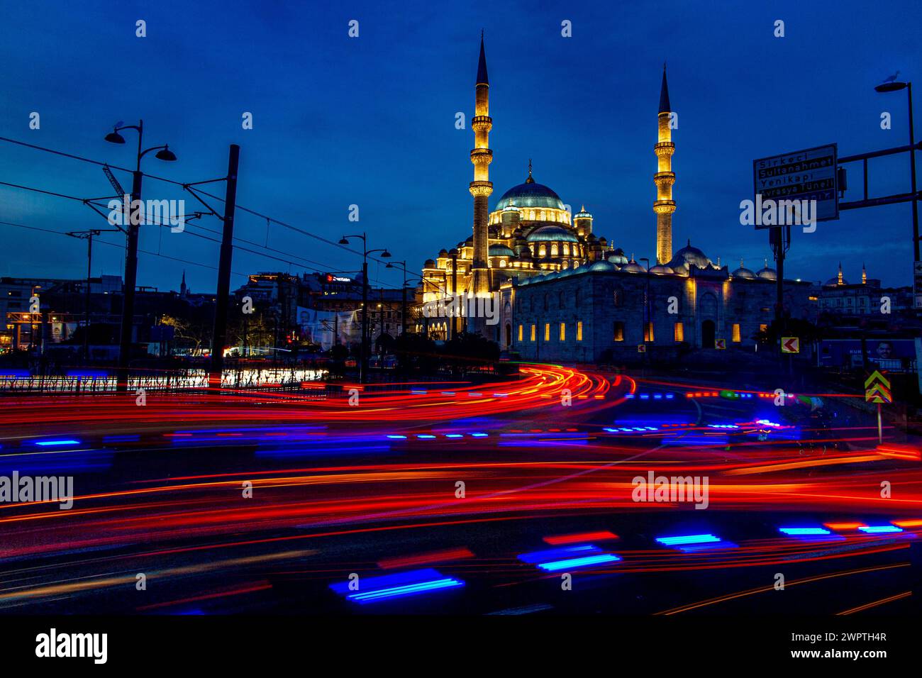 Light trails of early morning traffic in Istanbul with the new mosque ...