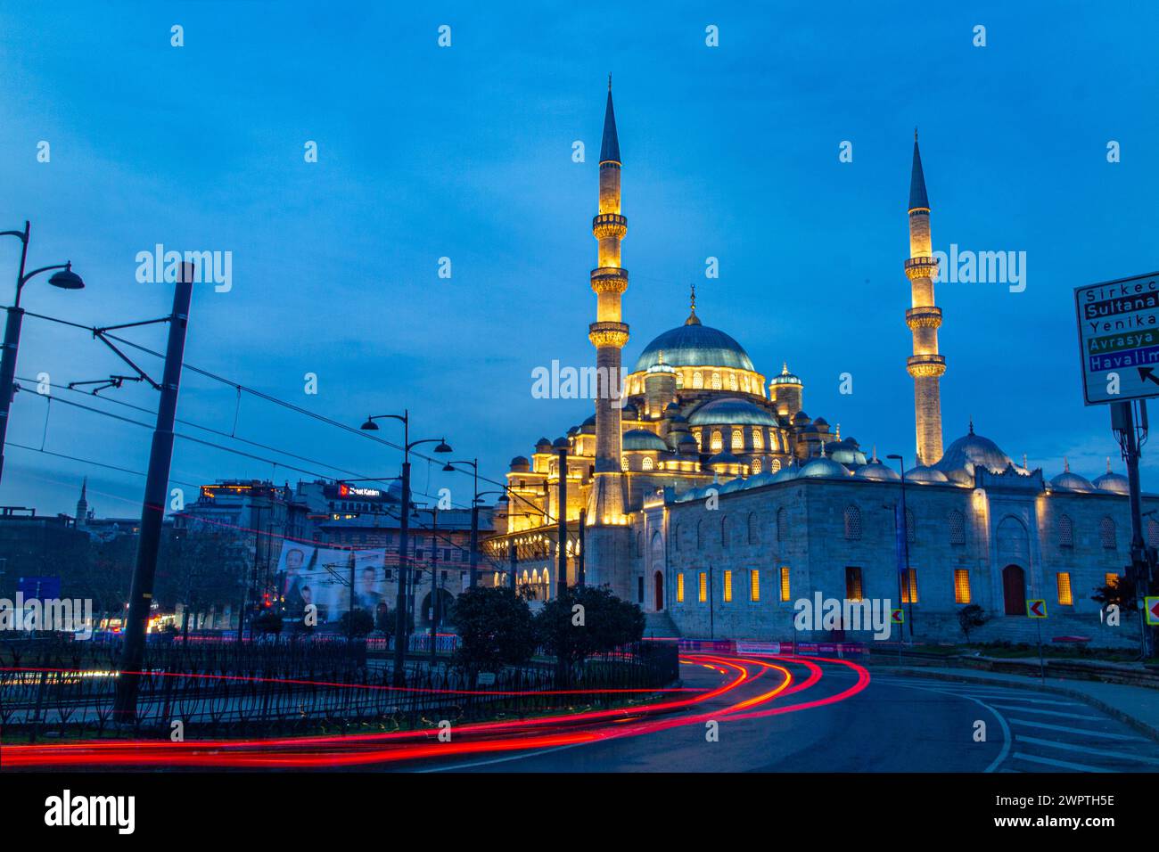 Light trails of early morning traffic in Istanbul with the new mosque ...