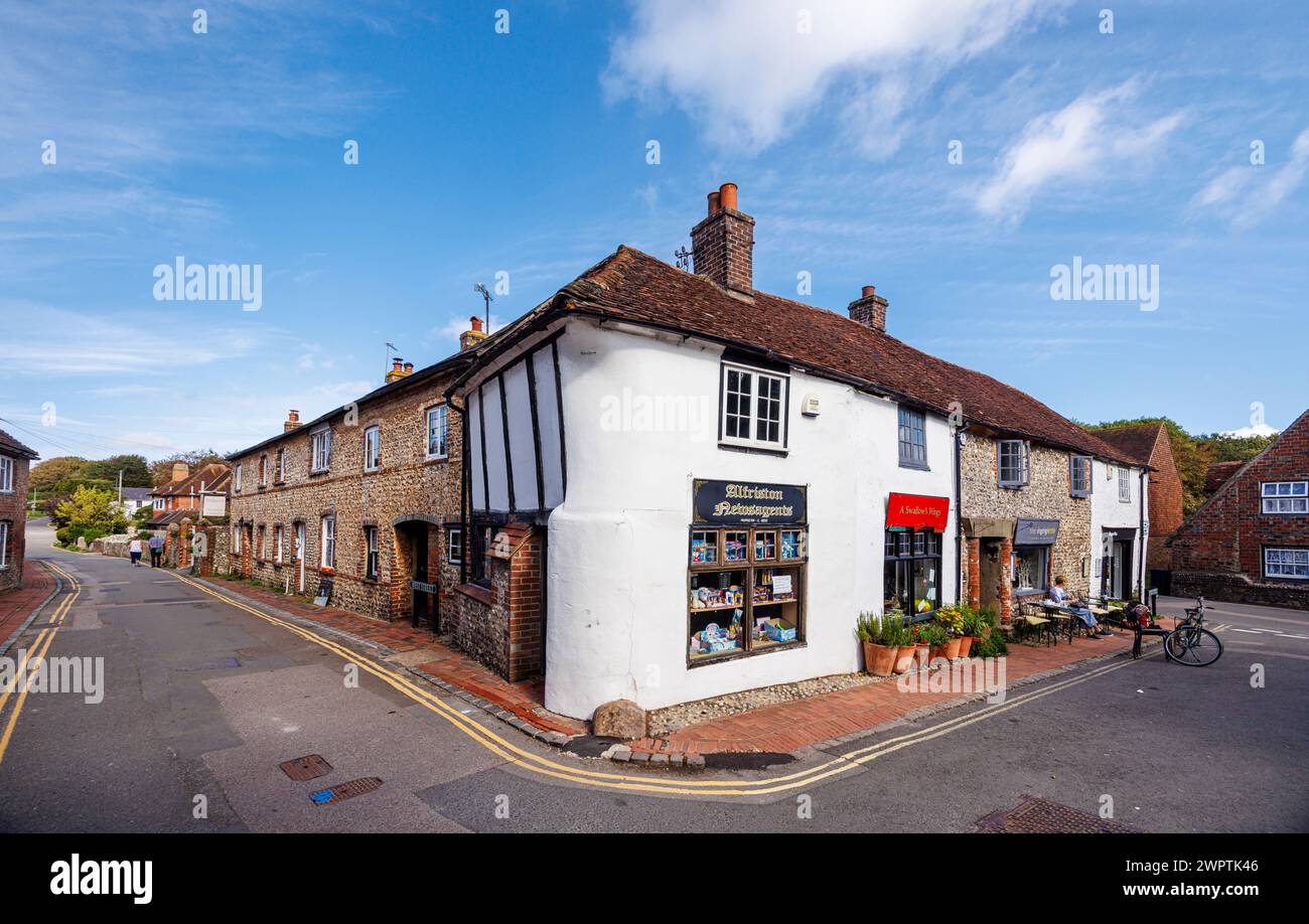 Shops and tea room in the village square of Alfriston, a pretty ...