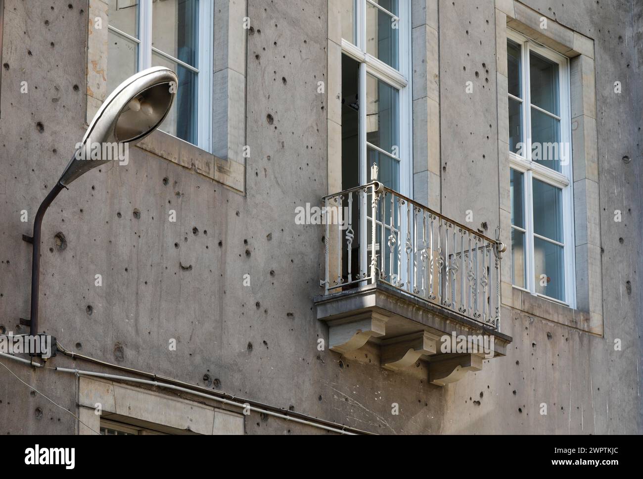 Contemporary history on a building in Berlin Mitte. A lantern from the ...