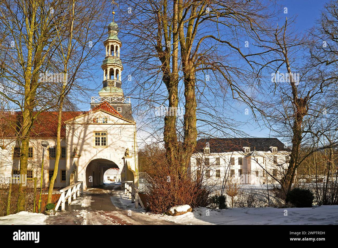 The moated castle in Dornum in winter, East Frisia, Lower Saxony ...