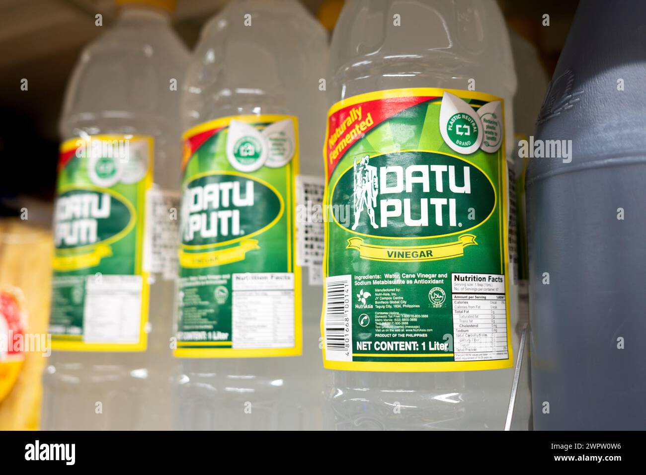 Datu Puti vinegar 1-liter container on a supermarket shelf - a product ...