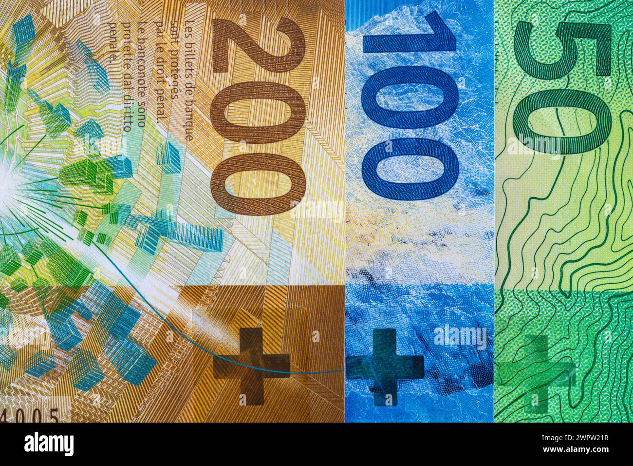 Closeup of 50, 100 and 200 Swiss franc banknotes for design purpose ...