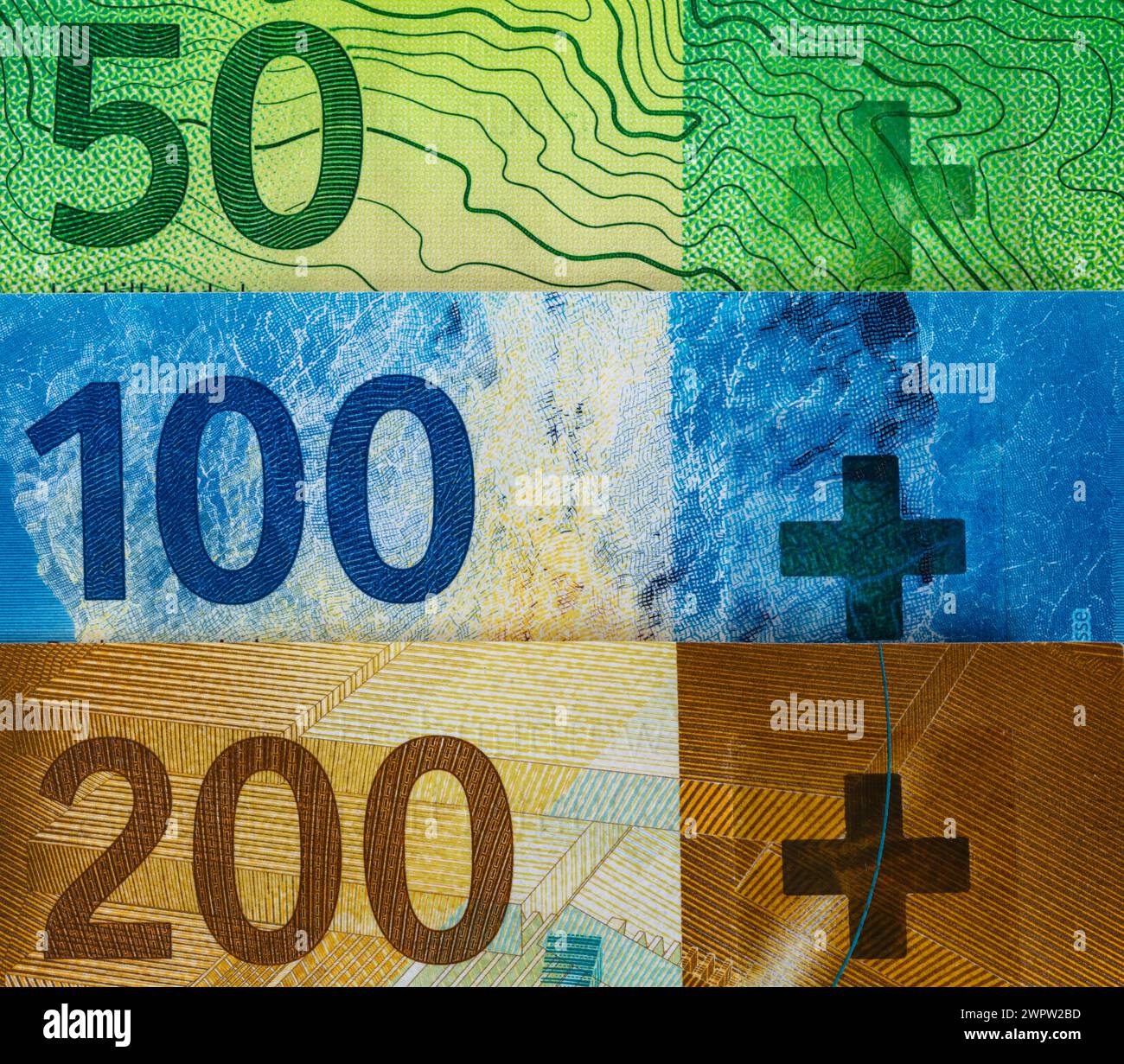 Closeup of 50, 100 and 200 Swiss franc banknotes for design purpose ...