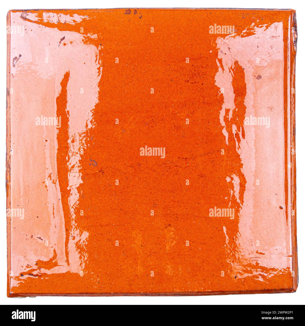 Old orange glazed furnace tile isolated on white background Stock Photo ...