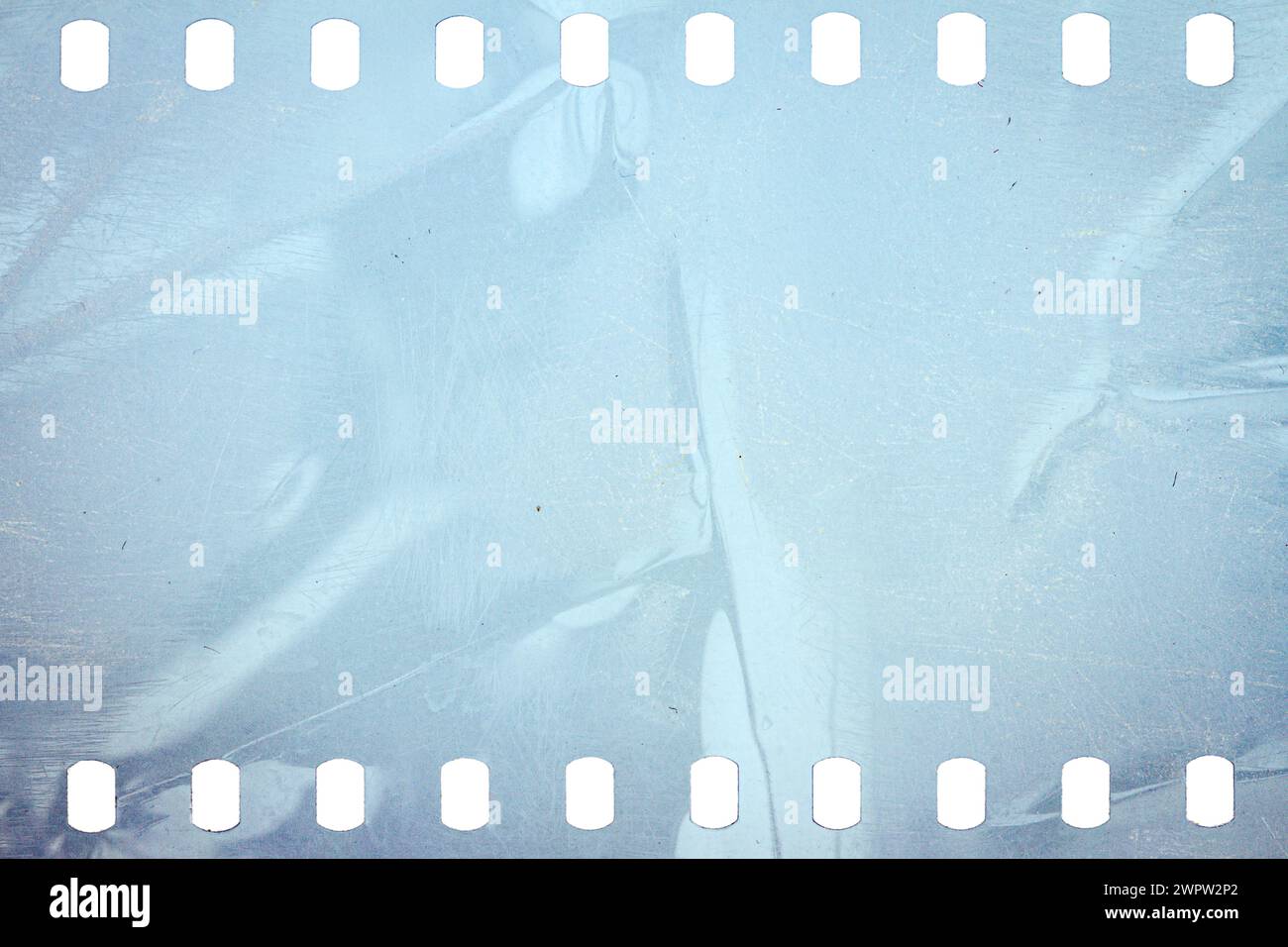 Dusty and grungy 35mm film texture or surface. Perforated scratched ...