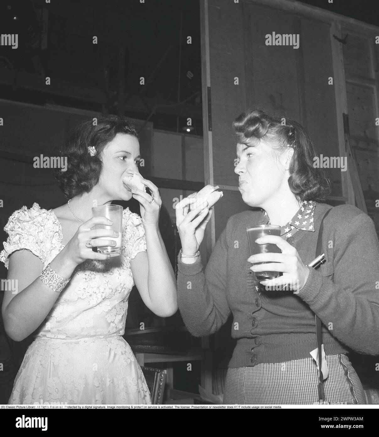 Historical women eating hi-res stock photography and images - Alamy