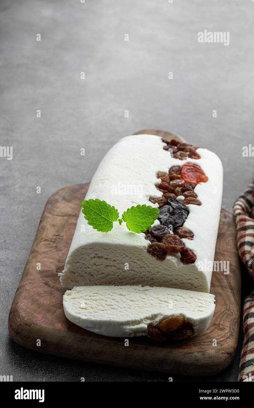 Nut nougat with dried fruit sweet candy on gray background Stock Photo ...