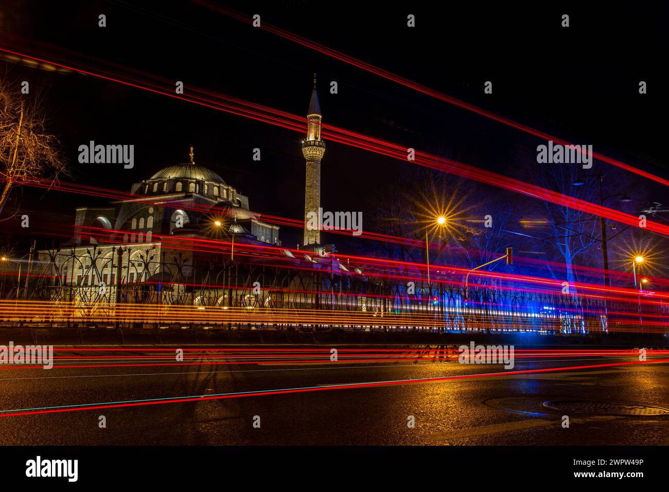 Light trails of early morning traffic in Istanbul with the new mosque ...