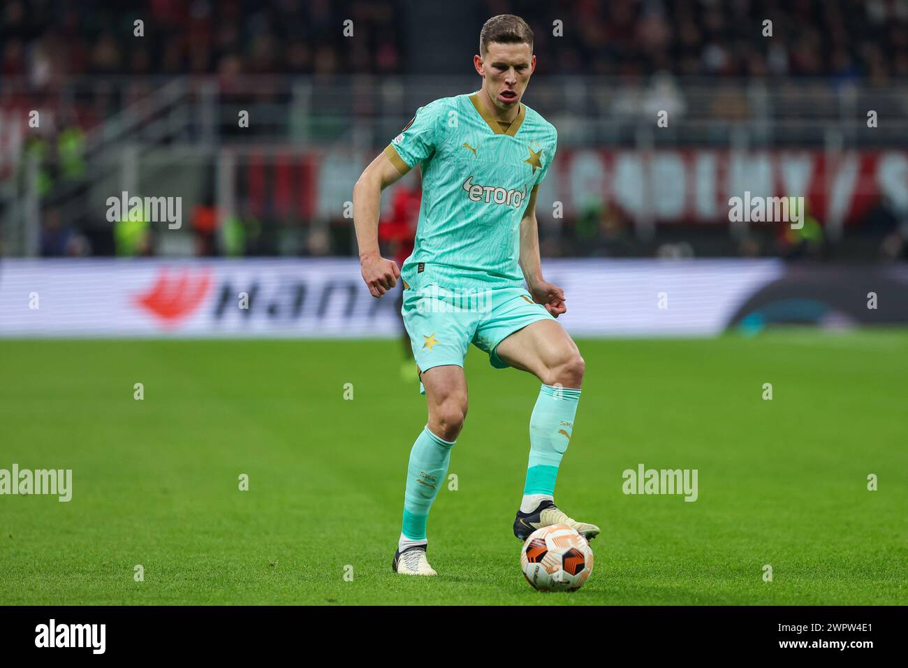 Lukas Provod of SK Slavia Praha seen in action during Round of 16 . Leg ...