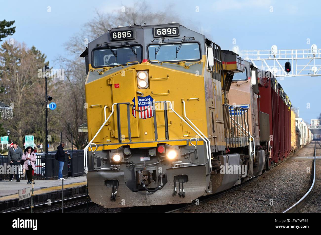 Glen Ellyn, Illinois, USA. Locomotives lead a Union Pacific Railroad ...