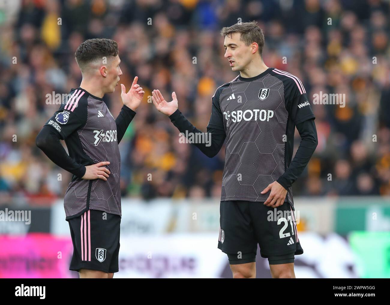 Wolverhampton, UK. 09th Mar, 2024. Timothy Castagne of Fulham speaks ...