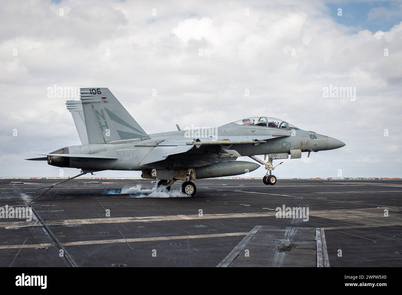 PHILIPPINE SEA (Feb. 28, 2024) An F/A-18F Super Hornet, attached to the ...