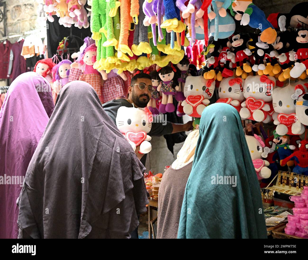 Old City Jerusalem, Israel. 09th Mar, 2024. Palestinians shop for toys ...