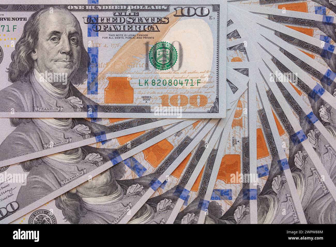 Fan of US 100 dollar banknotes for design purpose Stock Photo - Alamy