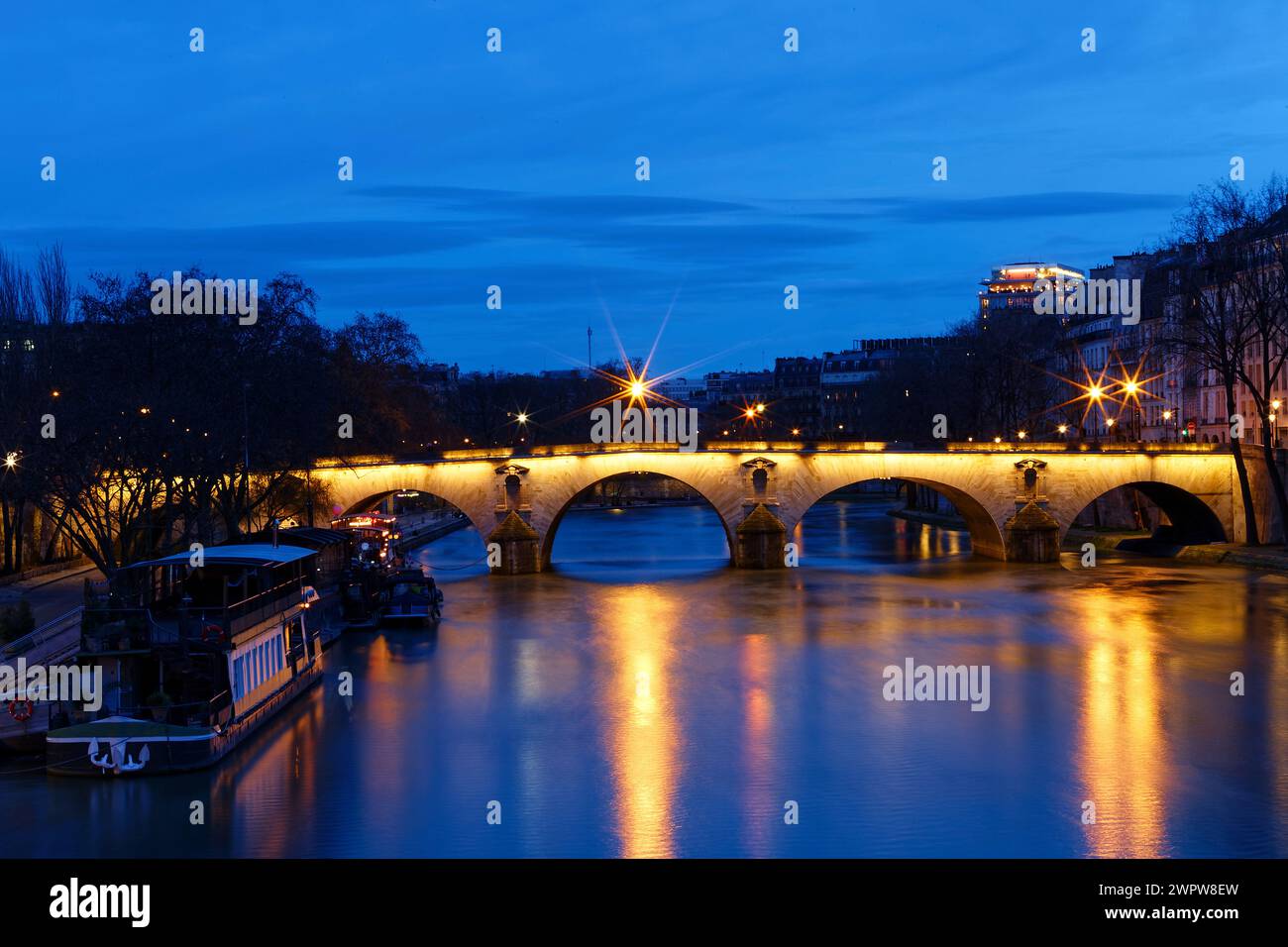 The view of bridge Ponte Marie over Seine river at night , Paris ...