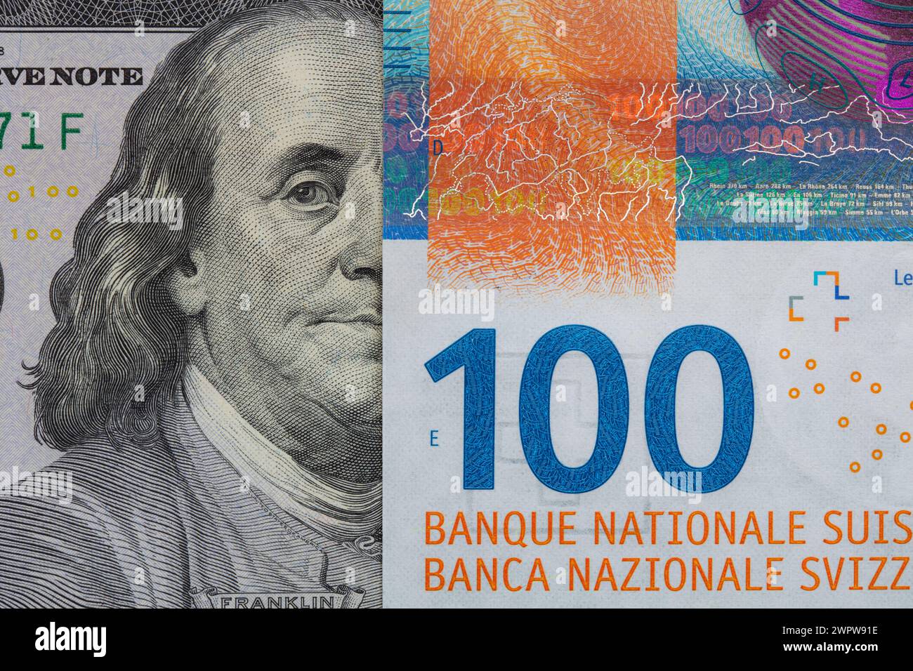 Closeup of 100 Swiss franc and 100 dollar banknotes for design purpose ...