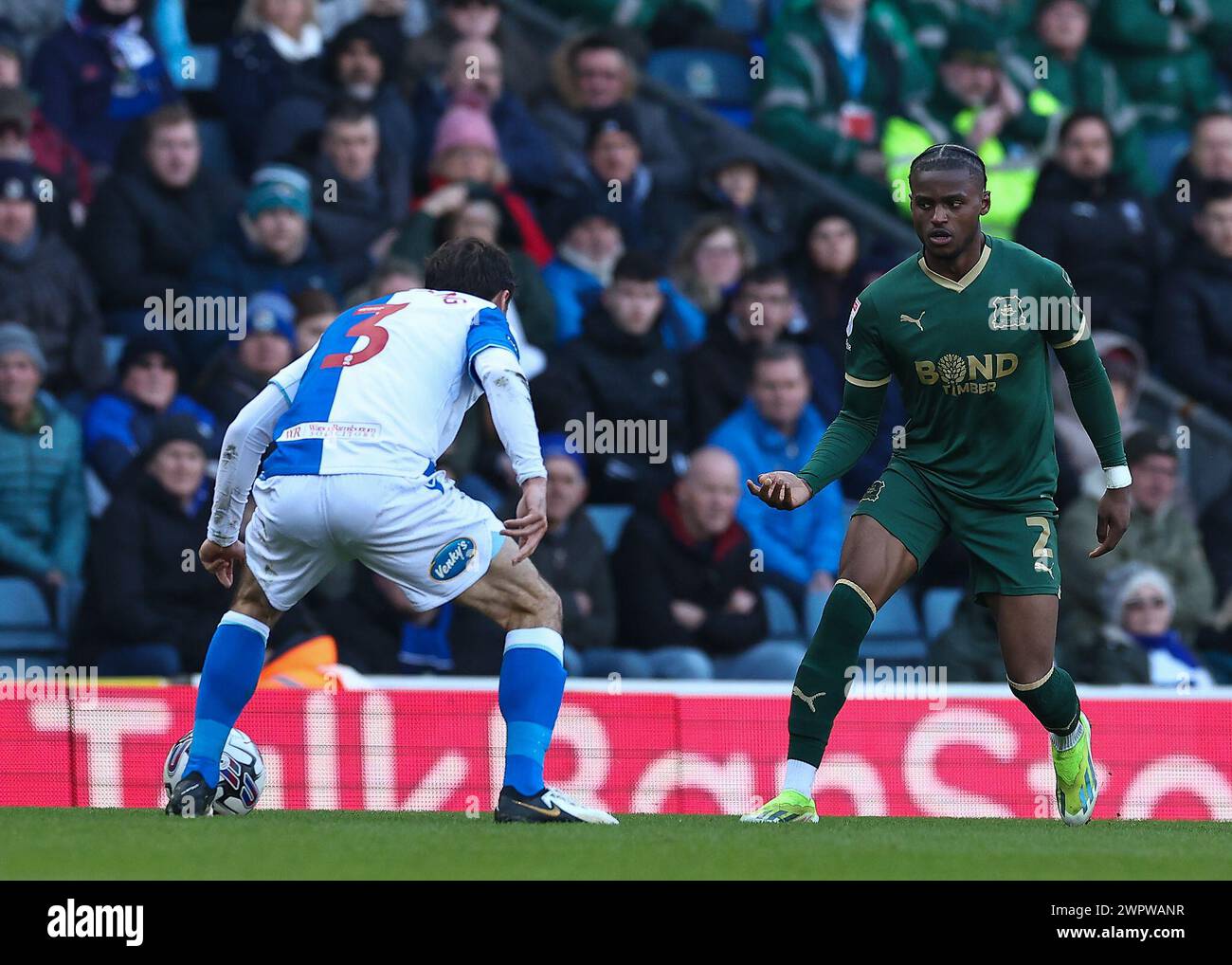 Bali Mumba of Plymouth Argyle passes the ball forward during the Sky ...