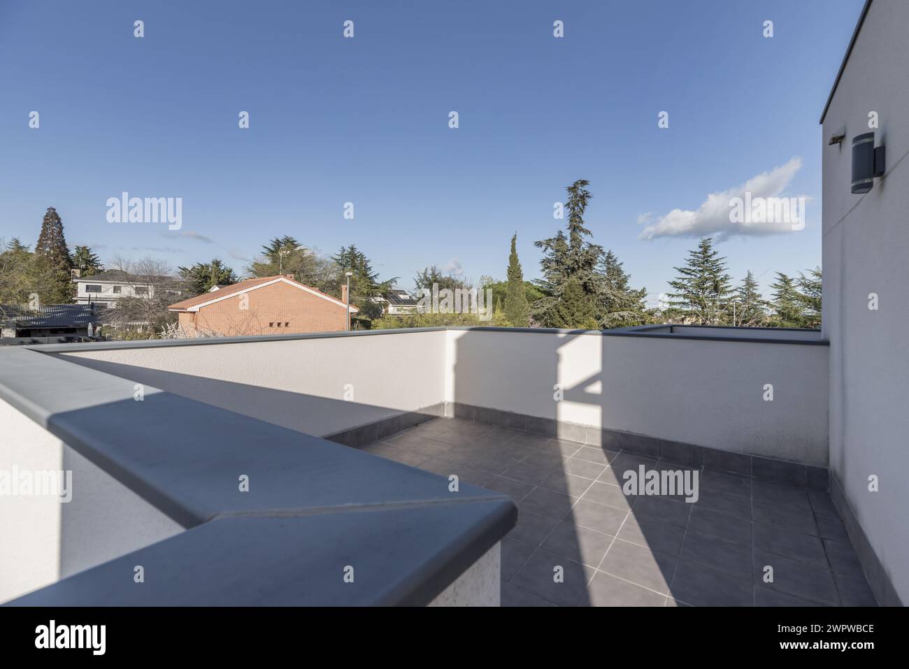 A large empty terrace in the attic of a residential house in an ...