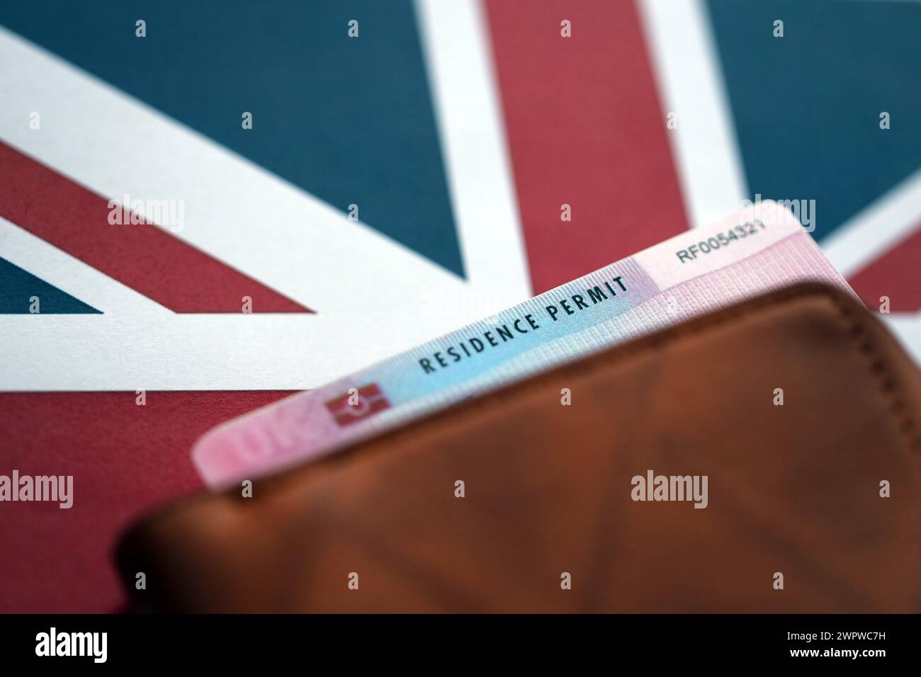 Residence Permit BRP card in purse on Union Jack flag close up Stock ...