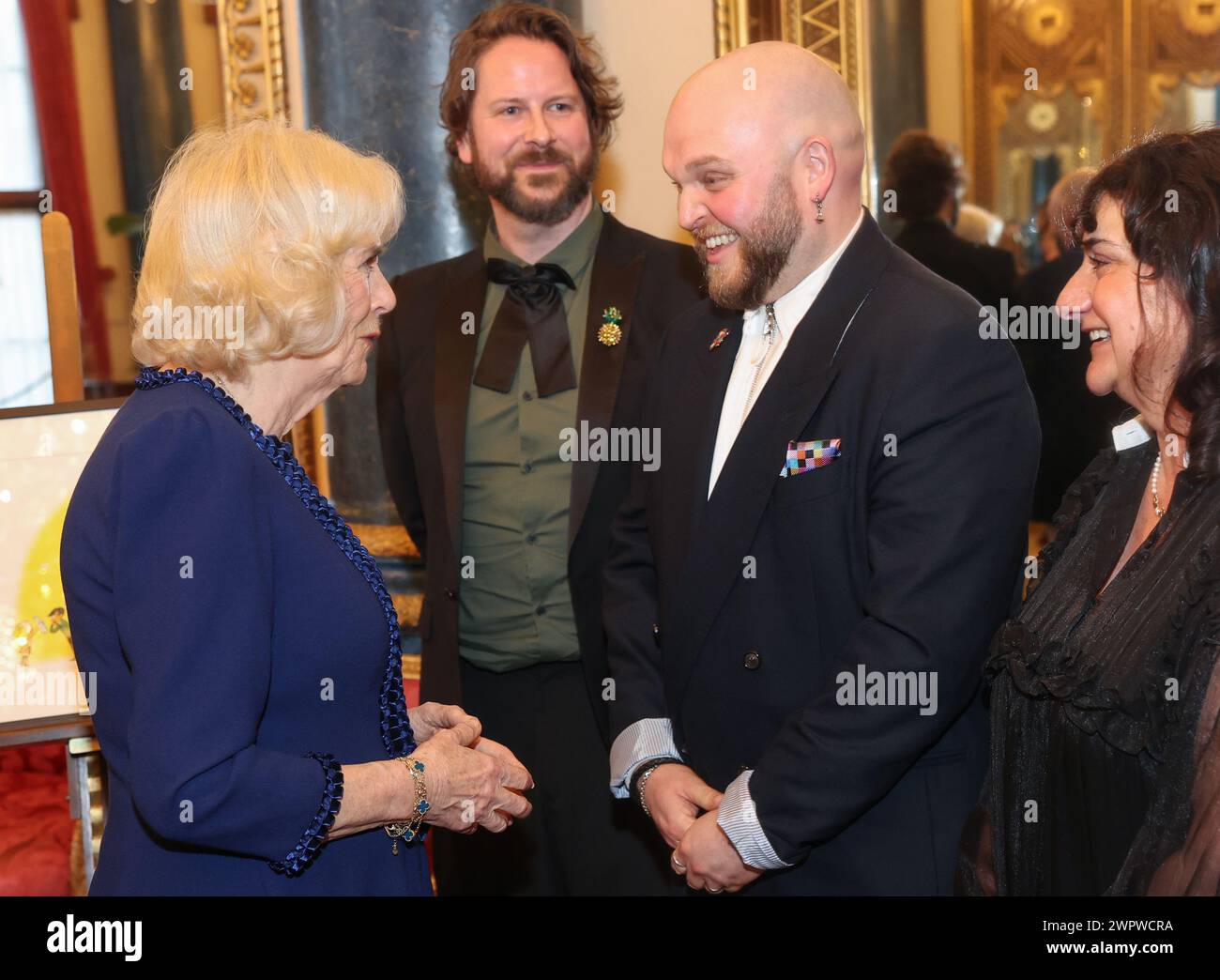 Queen Camilla speaks to a guest during a reception for the BBC's 500 ...