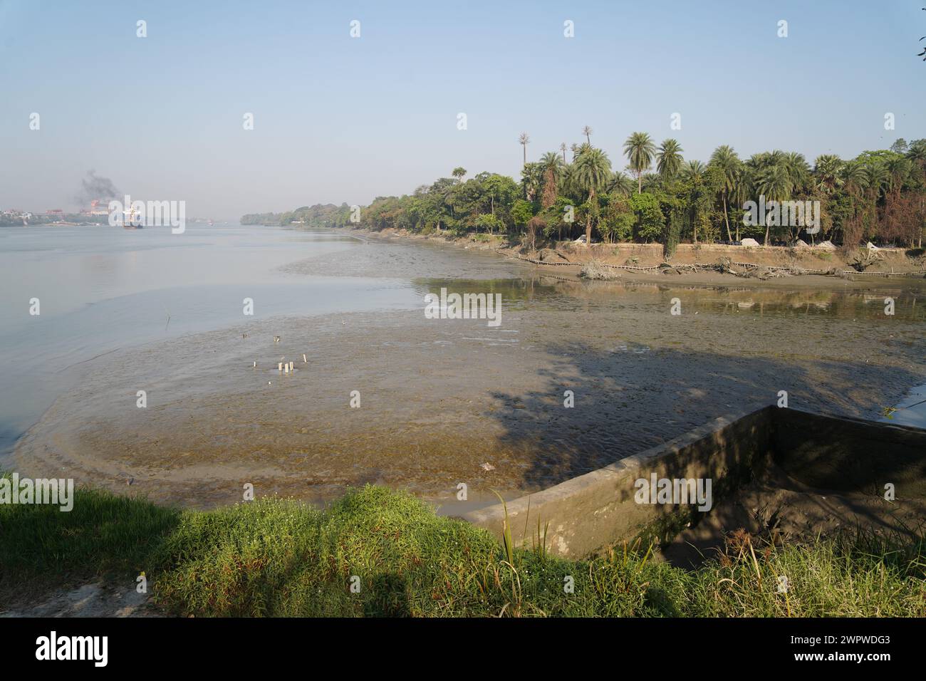 Riverbank errosion or river bank failure due to tidal wave of the ...