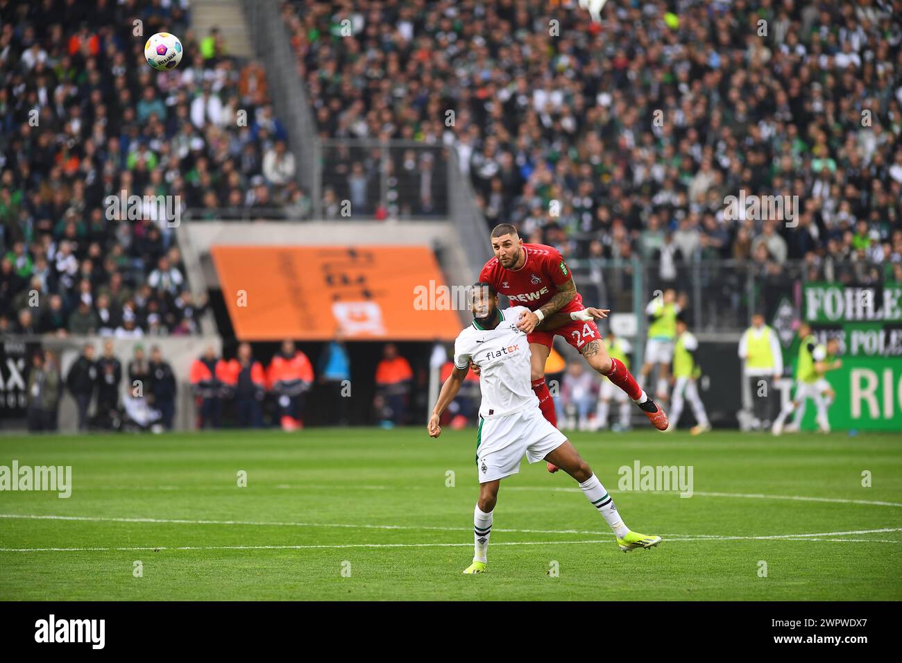 MOENCHENGLADBACH, GERMANY - 9 MARCH, 2024: Jordan Pefok, Julian Chabot ...