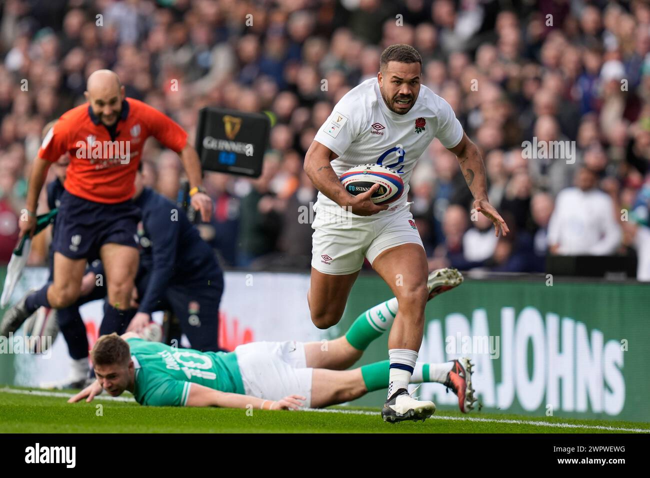 Ollie Lawrence of England breaks away to sore a try during the 2024 ...