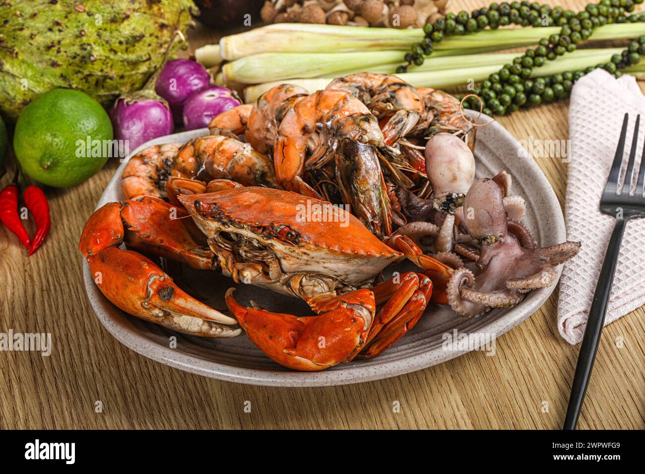 Luxury seafood mix - crab, tiger prawn, octopus Stock Photo - Alamy