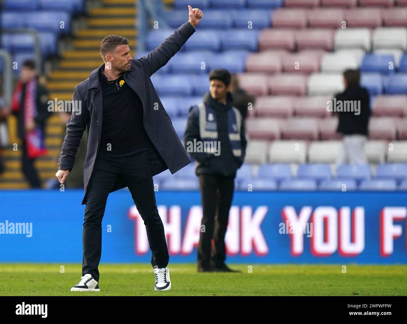Luton Town manager Rob Edwards salutes the fans following the Premier ...