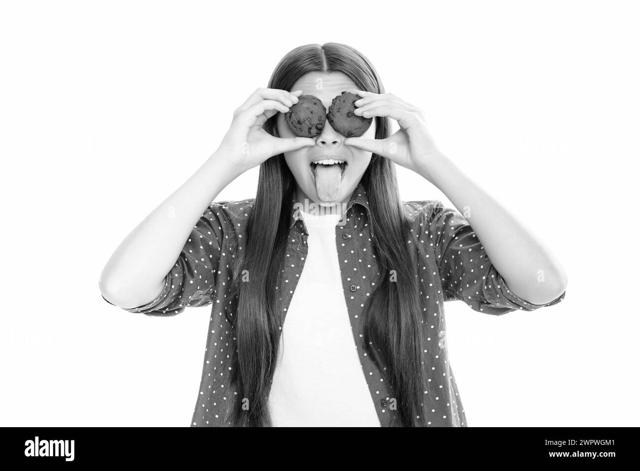 Funny face. Teen girl eating cookies, happy childhood, food, sweets and ...